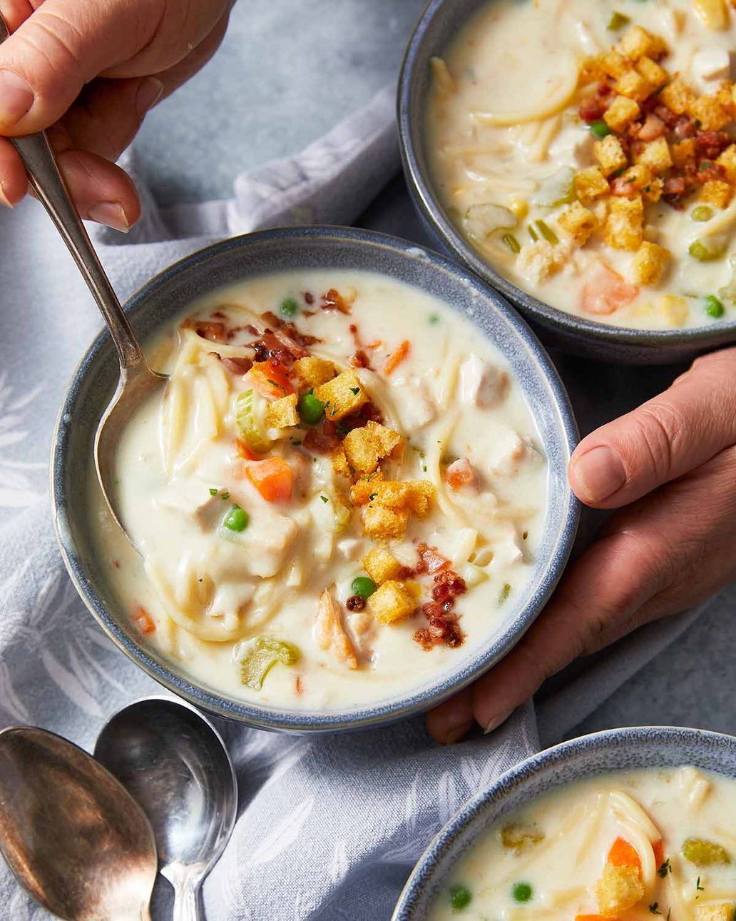 Creamy chicken noodle soup with mini croutons - RecipeTin Eats