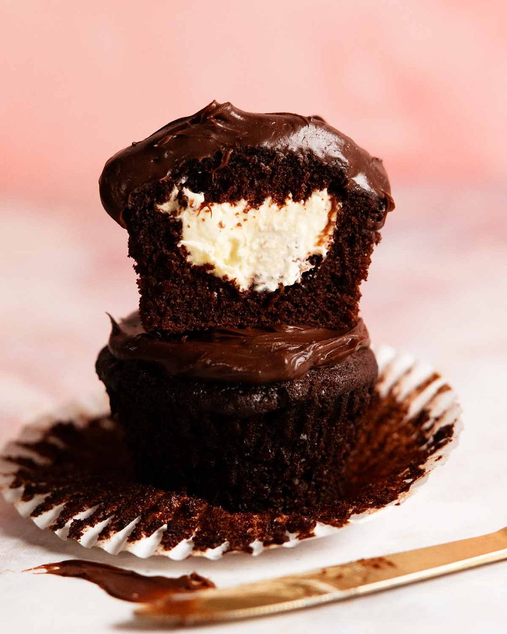 Whipped Cream-Filled Chocolate Cupcakes With Chocolate Ganache Frosting ...